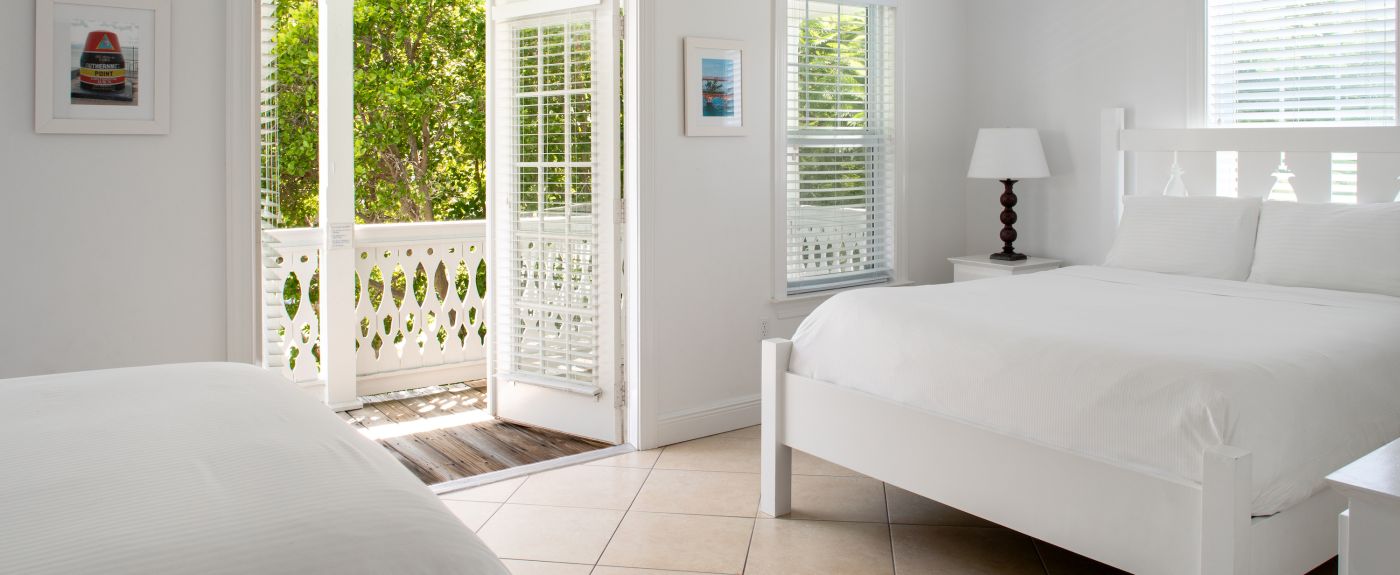 Beachfront 2-Bedroom 2-Story Beach House - Tranquility Bay Beachfront ...